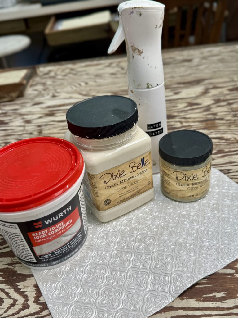Embossed Paint Technique on Thrifted Sign